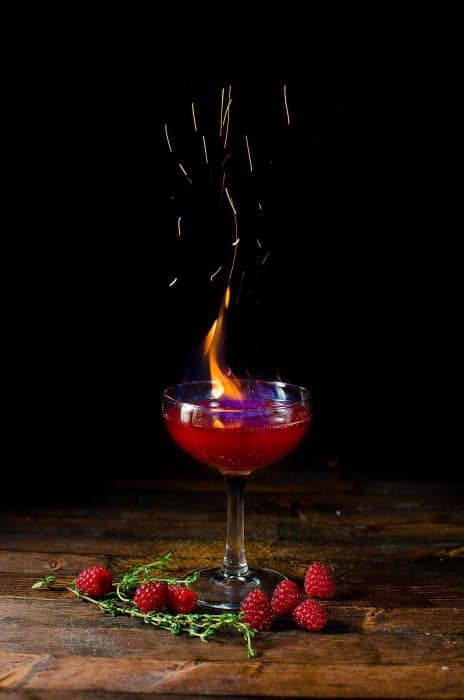 Flaming Dragon's Blood Cocktail (Thyme and Raspberry Daiquiri Cocktail ...