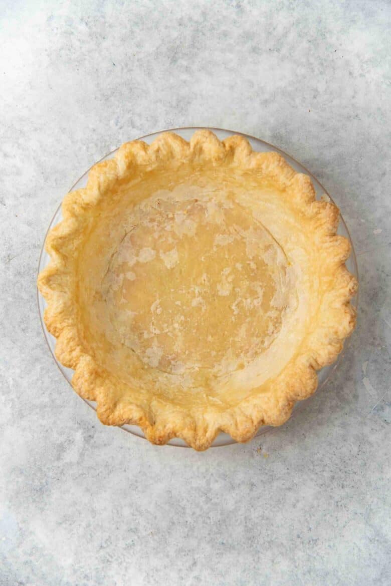 How To Blind Bake Pie Crust (Step by Step Guide) - The Flavor Bender